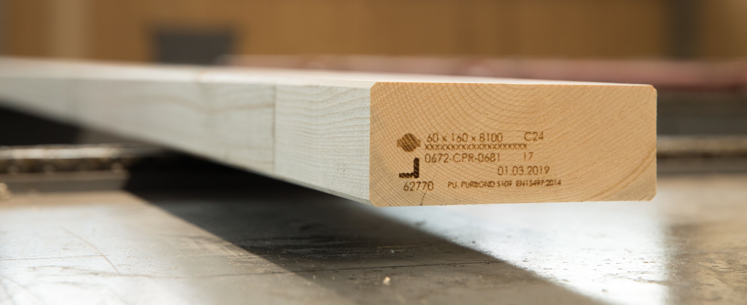 Laser marking of building materials