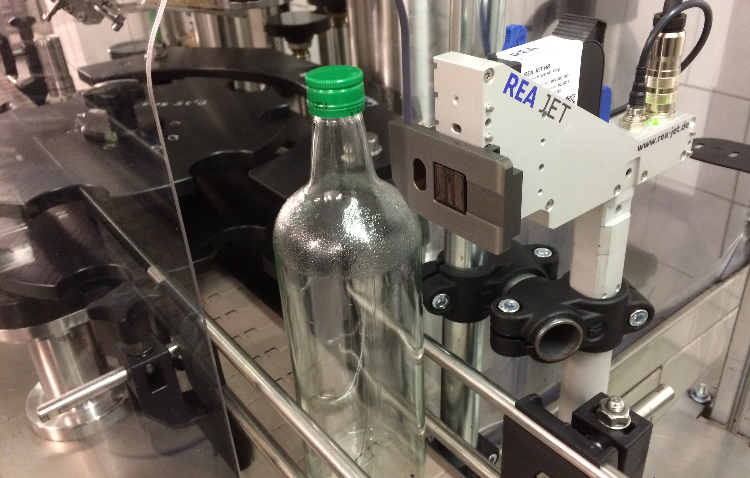 Marking, labeling and verifying beverage packaging