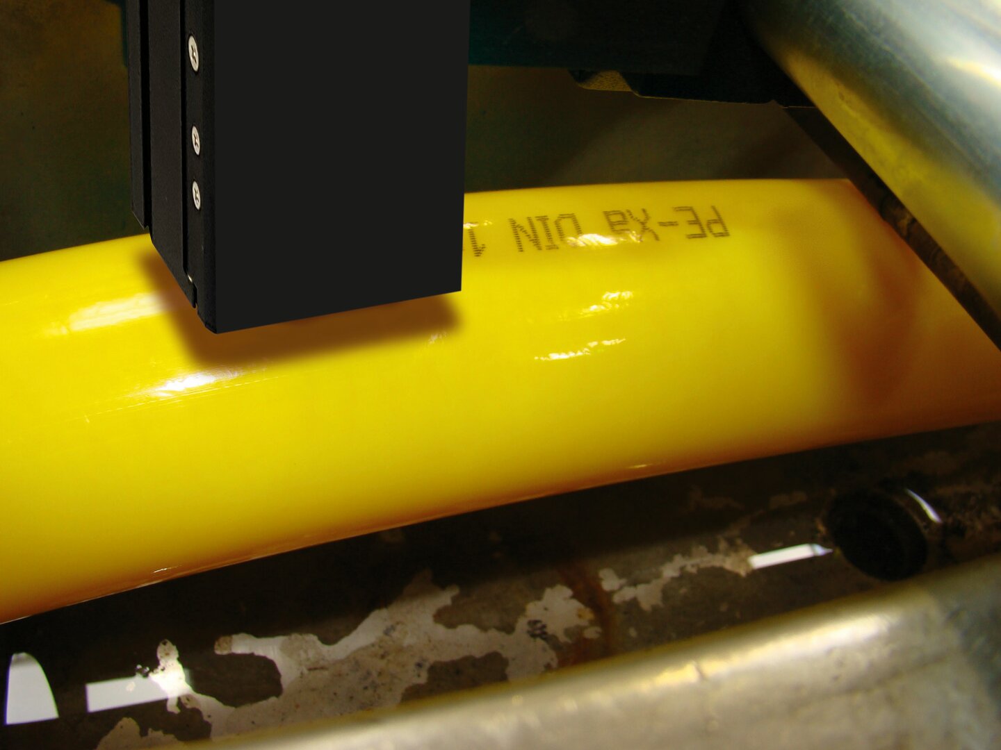 Marking, labeling and verifying plastic surfaces