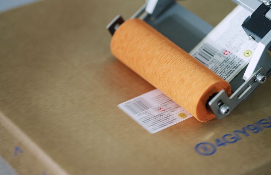 Marking, laser cutting, labeling and verifying paper and cardboard