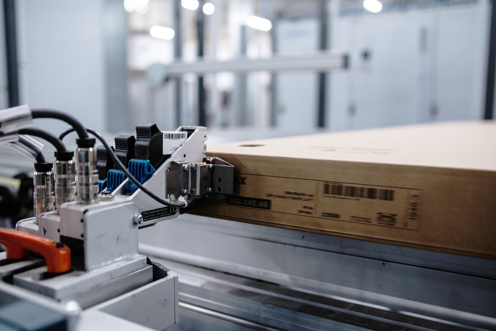 Marking, laser cutting, labeling and verifying paper and cardboard